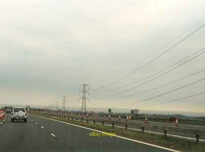Photo 6x4 Pylons stretching into the distance Aglionby The M6 bears to ...