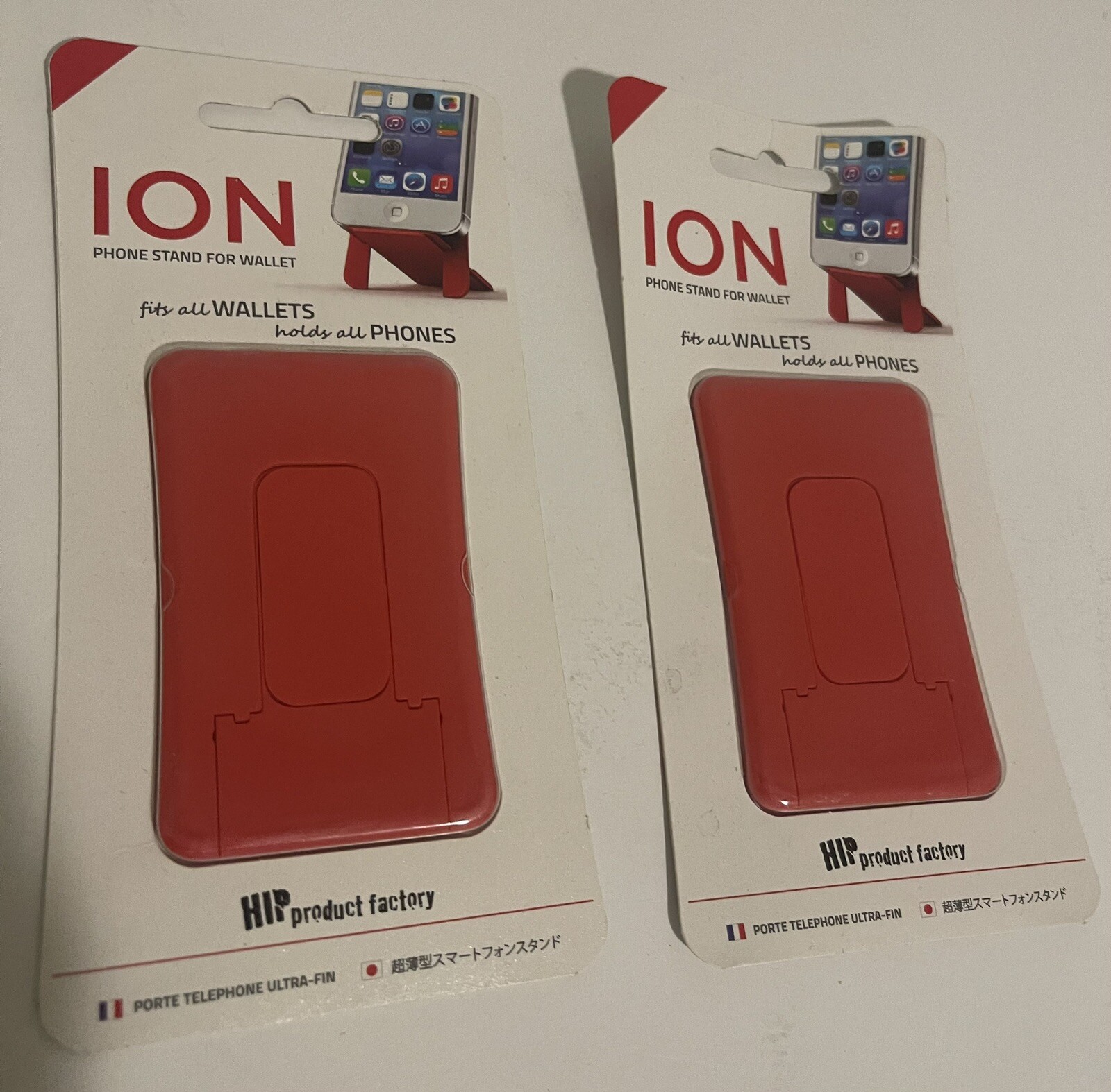 (2) ION CELL PHONE HOLDERS Apple-Android phone/stand holder red ...