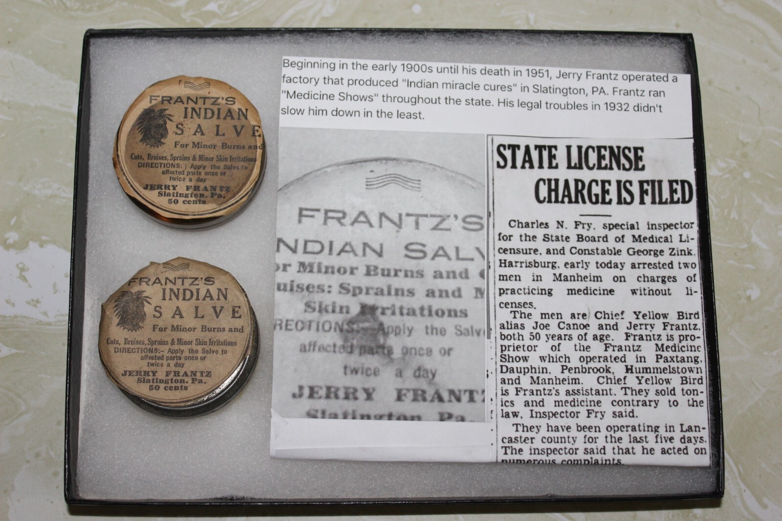AS FOUND, DISPLAY CASE WITH ( 2 ) TINS OF FRANTZ'S INDIAN SALVE ...