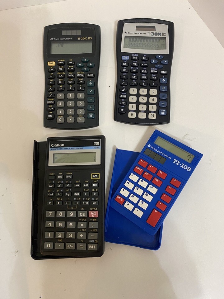 4 Calculators 2 Texas Instrument 30X & 1 TI Basic 180 And 1 Canon Sci ...