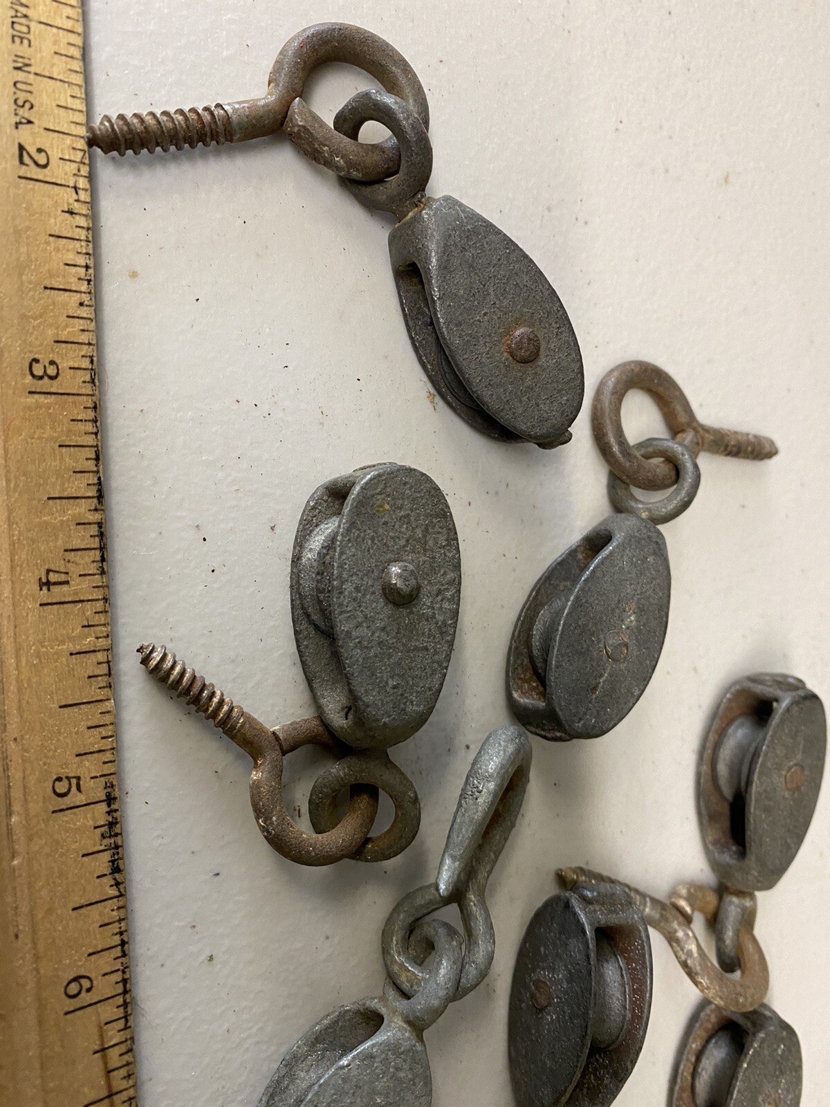 ANTIQUE VINTAGE LOT OF 8 MINIATURE PULLEYS WITH SCREW HOOKS MEASURES 1. ...