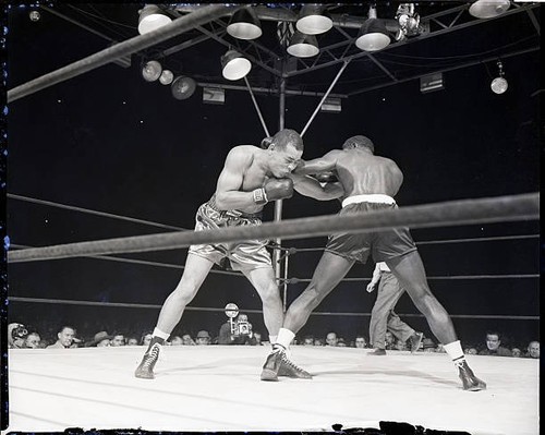 Joe Louis Punching Ezzard Charles 1950 OLD BOXING PHOTO | eBay