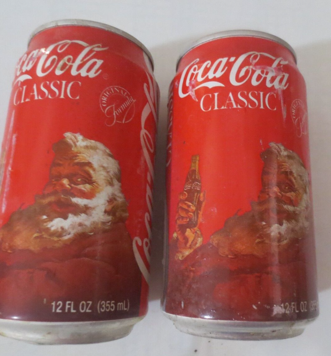 Two Coca-Cola Classic Santa Cans Tabs are on but empty Rust holes ...