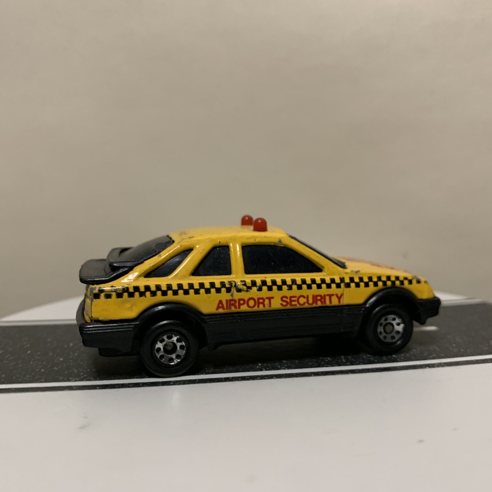 Matchbox Ford Sierra XR4i 1:58 Airport Security Car Yellow/Black/Red As ...