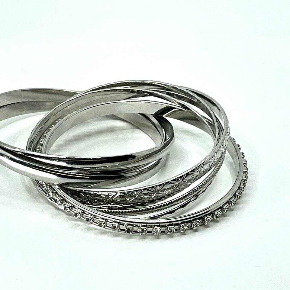 Bangle Bracelets Silver Tone Stack of 8 Connected Nice Bangle Bracelets ...