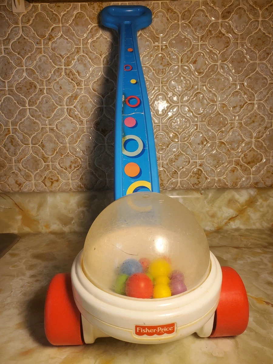 Boy Pushing Toy Popper