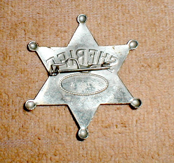 Six Point Badge