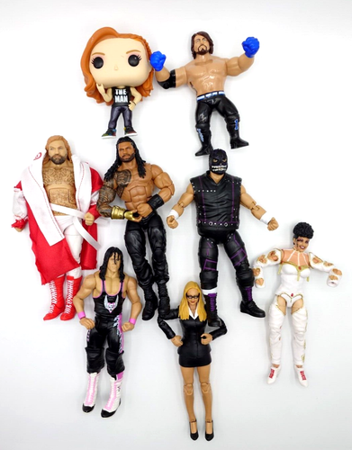 WWE Lot Toy Action Figures Roman Reigns AEW Evil Uno Bret Hart Big John ...