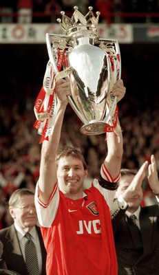Arsenal captain Tony Adams lifts the FA Carling Premiership trophy- Old ...