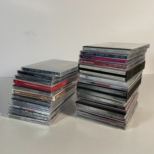 Lot of 25+ Cds Kiss Alive - Bob Welch - America - Asia - Jethro Tull ...