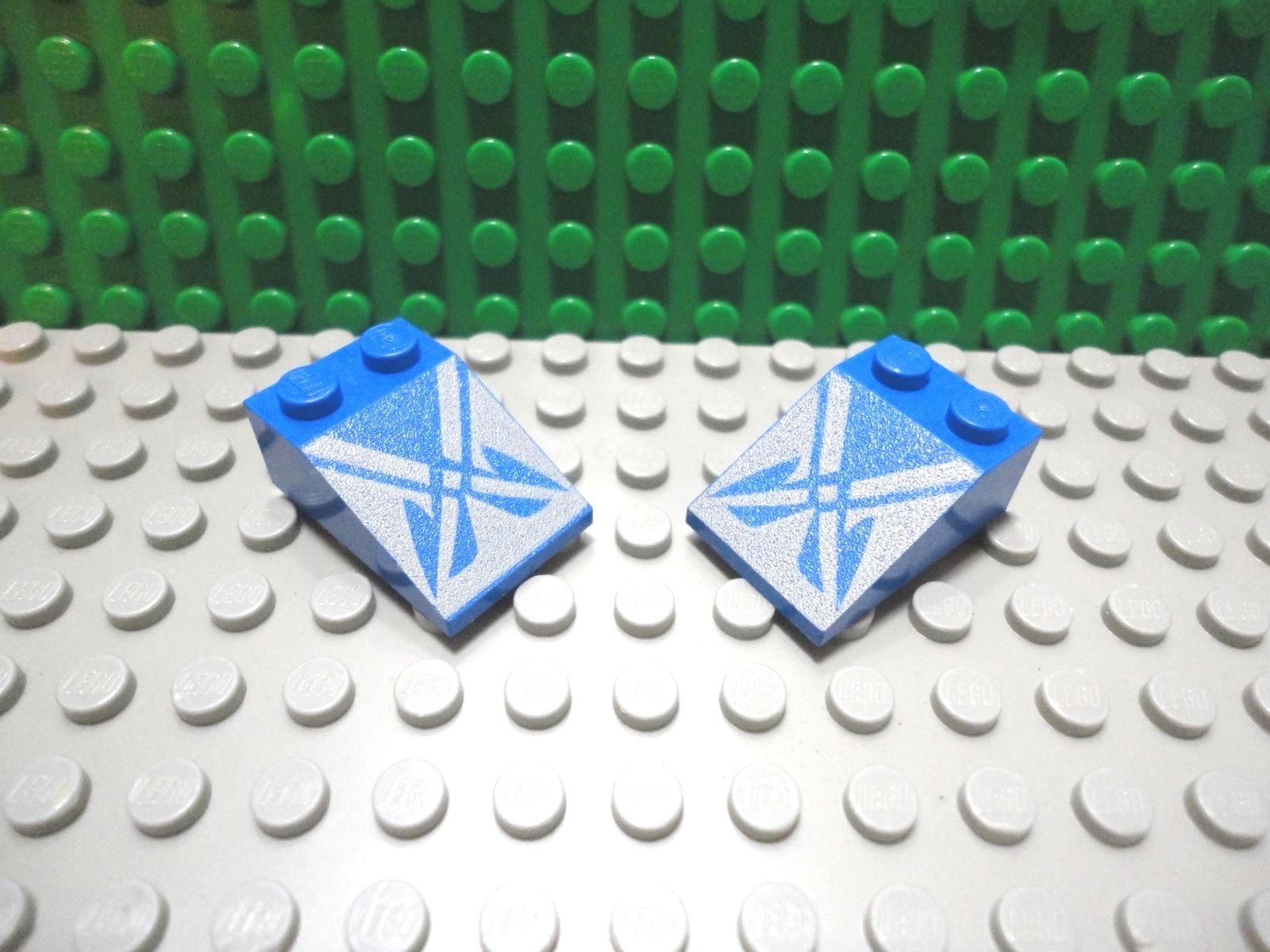 Lego 2 Blue 3x2 sloped brick with printed X design | eBay