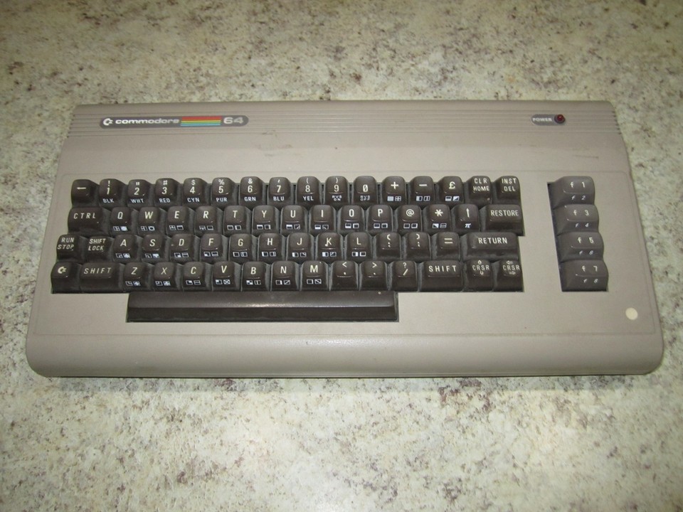 Commodore 64 Personal Computer, Floppy disks, Games, Modem, Manuals ...
