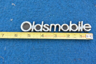 80-90 OLDSMOBILE SCRIPT EMBLEM METAL | eBay