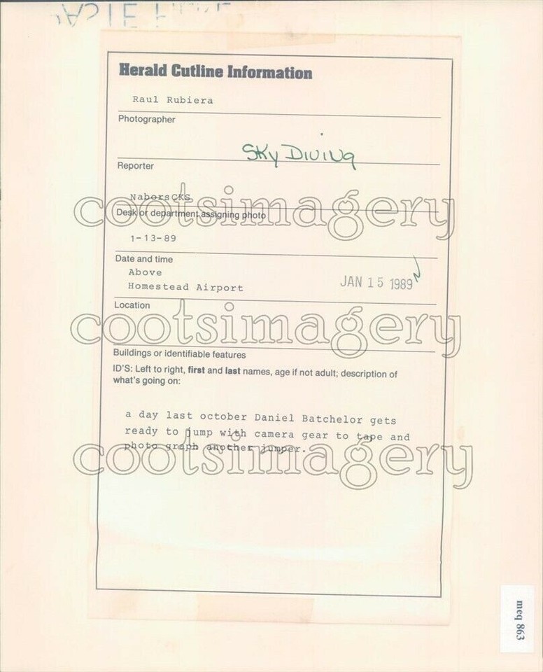 1989 Press Photo Daniel Batchelor Prepares to Skydive Cameras Mounted ...