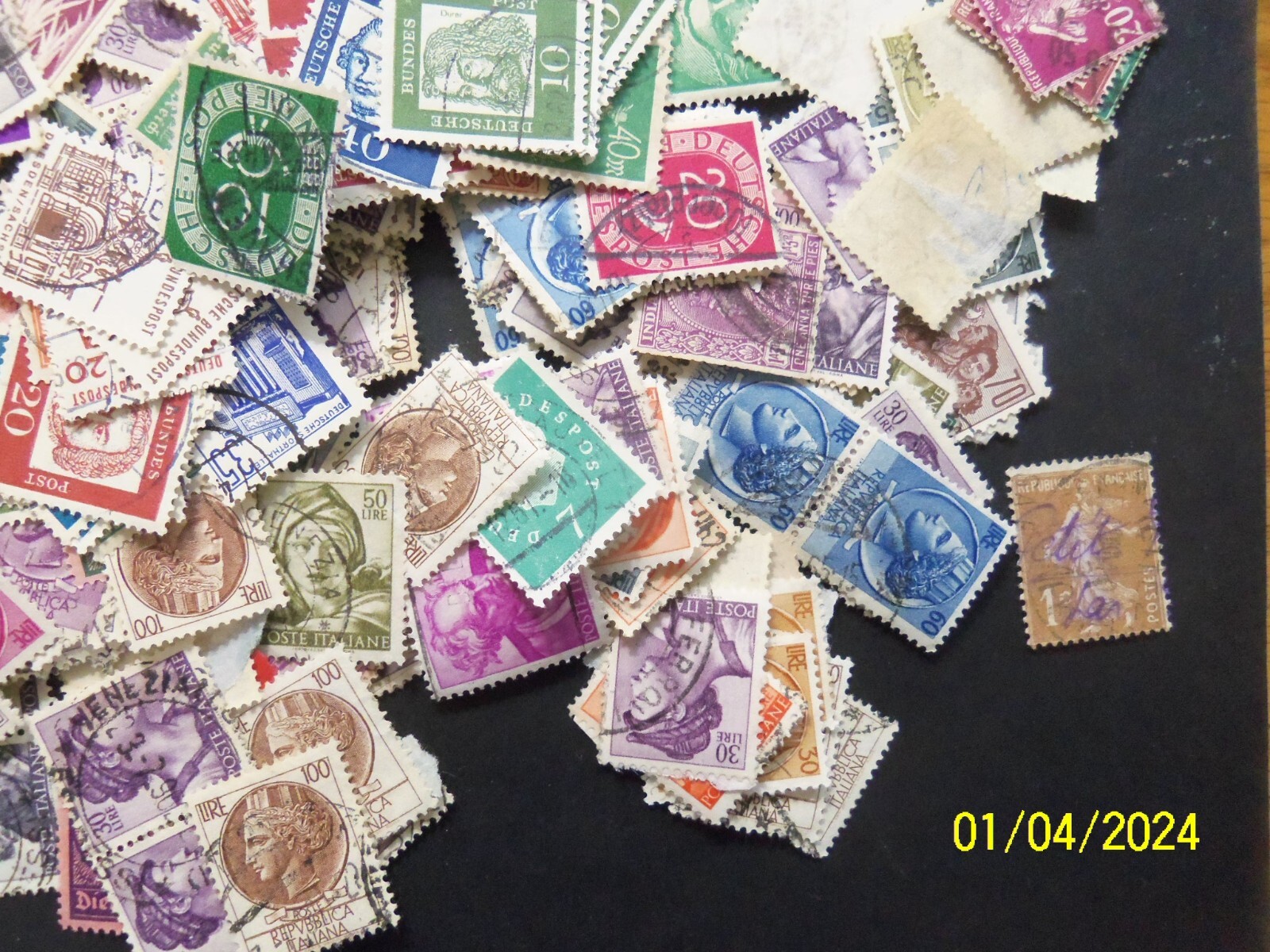 FOREIGN STAMP MIXTURE - 1/2 OZ OF A NICE MIX OF STAMPS - EXPECT SOME ...