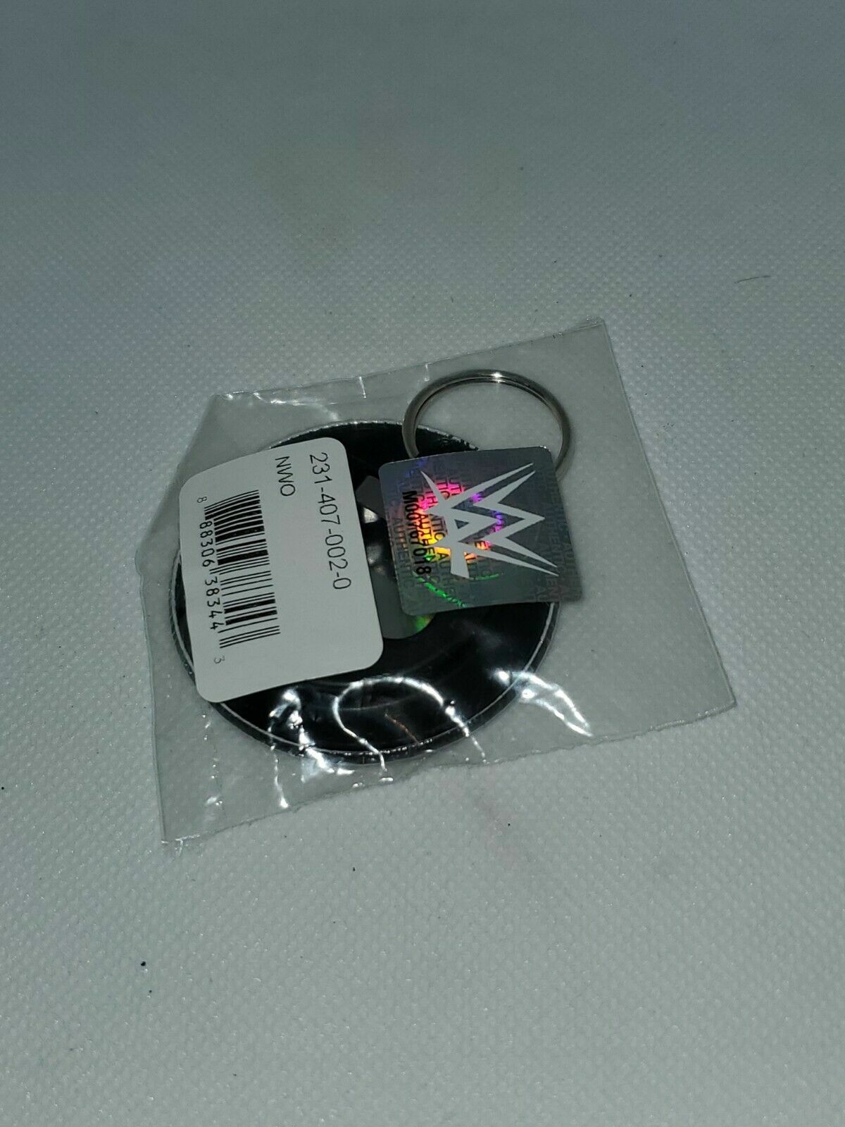 wwe authentic NWO LOGO KEYCHAIN BOTTLE OPENER new world order wcw wwe ...