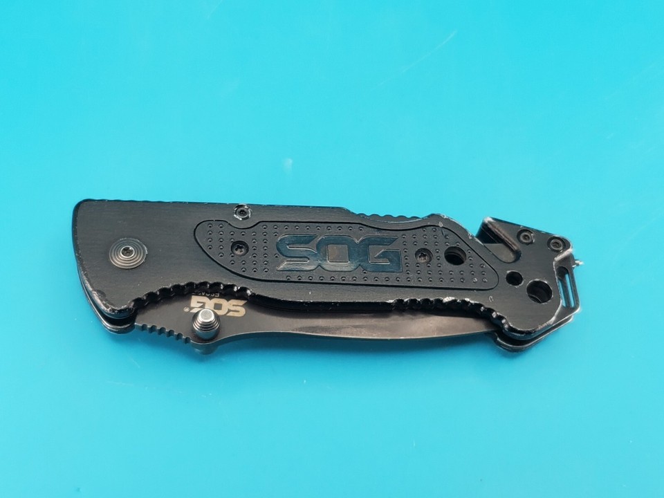 SOG Escape Folding Rescue Pocket Knife Glass Breaker Strap Belt Cutter ...