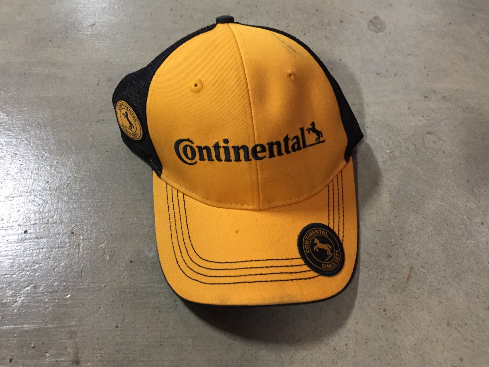 Yellow Continental Tire Trucker Cap Adjustable Back Black mesh Hat ...