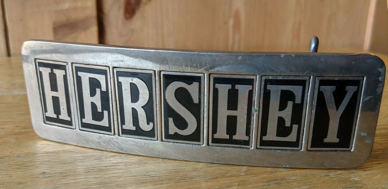 1984 NAP U.S.A. NB7 SOLID BRASS, "HERSHEY". RECTANGUL… - Gem