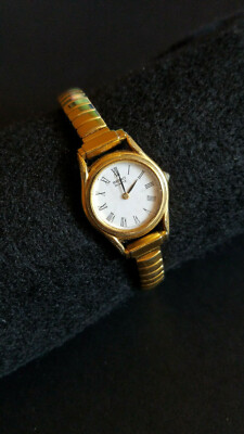 Seiko Womens 2P20-0089 Quartz Watch Gold Tone Stretch Watch Band White ...