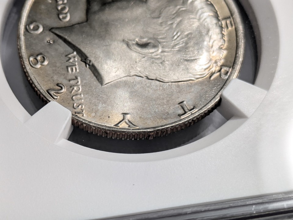 1982-P Kennedy Half Dollar NGC MS-65 Broken Collar Two Break Planchet ...