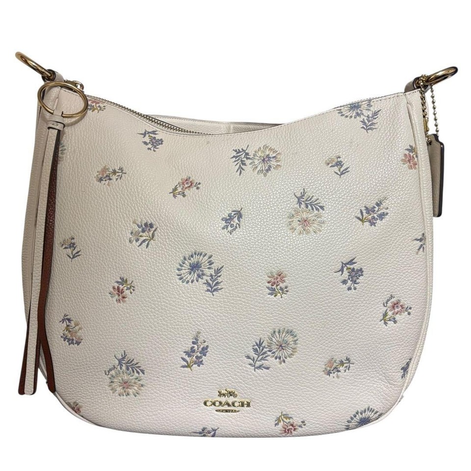 Borsa a tracolla Coach Meadow Prairie in pelle lucida con ciottoli ...