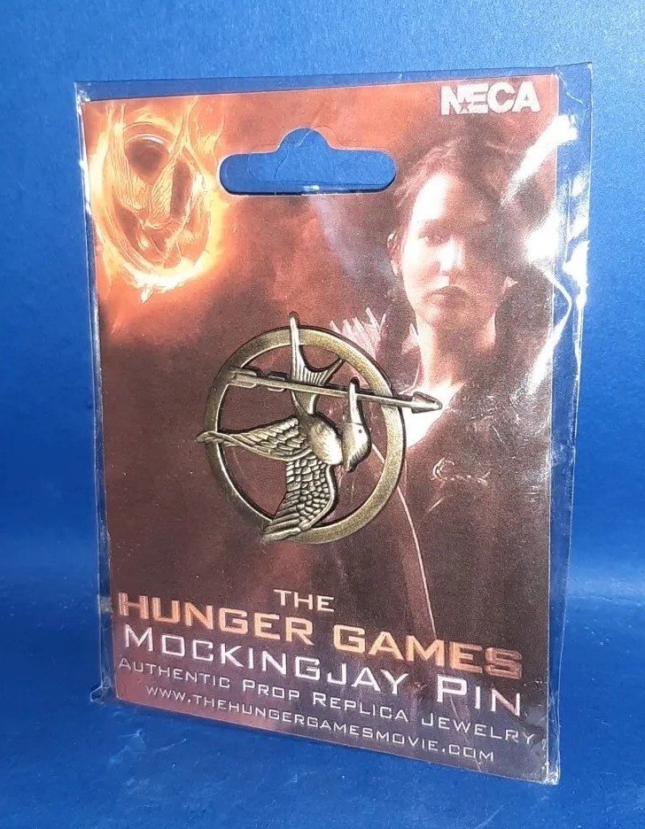 Pin The Hunger Games Mockingjay Jay Gadget Figure | eBay