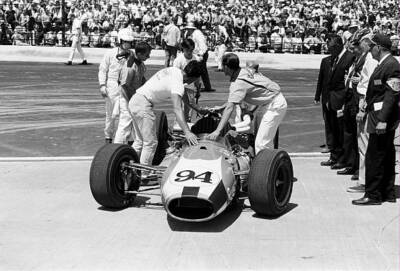 Crews push Mel Kenyon's Gerhardt 65 back out on to the track RACING OLD ...
