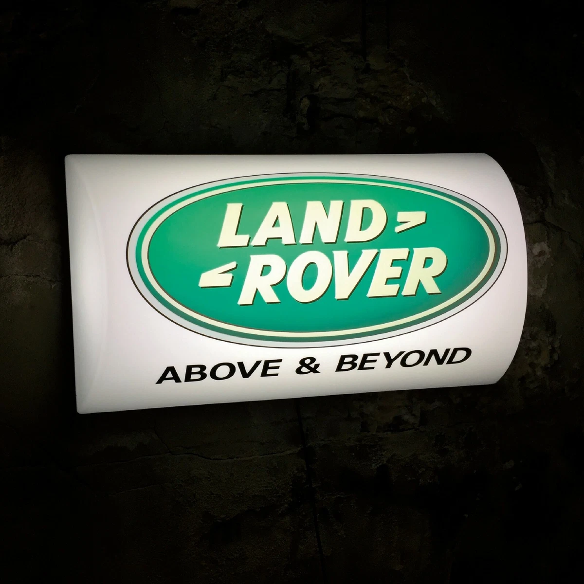 Land Rover Above And Beyond Logo