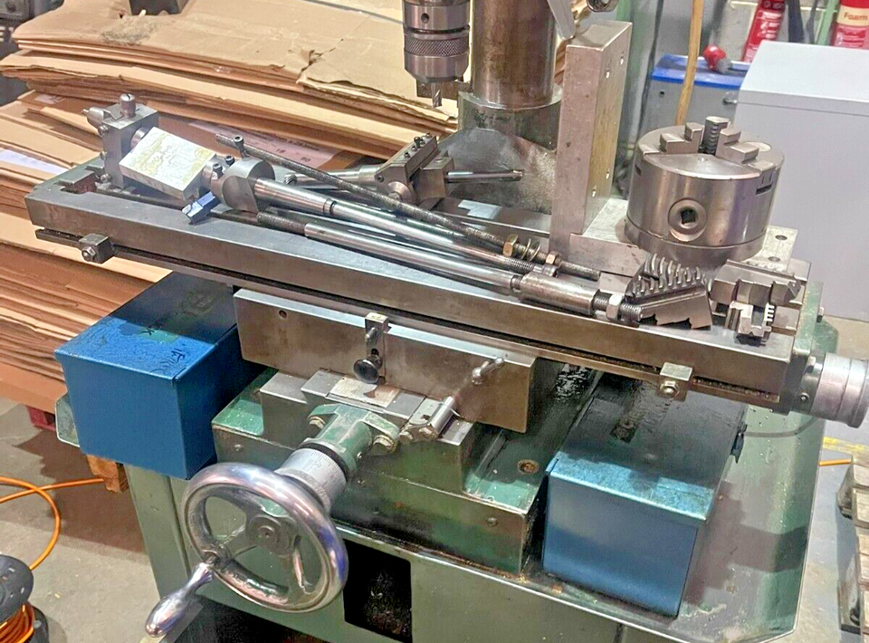 Emco milling machine on a cabinet with accessories lathe chuck collet ...