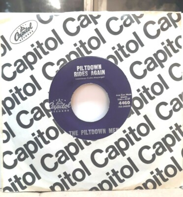 45 RPM ROCK THE PILTDOWN MEN, BUBBLES IN THE TAR / PILTDOWN RIDES AGAIN ...
