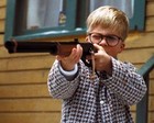 A Christmas Story Peter Billingsley as Ralphie aims Red Ryder air rifle ...