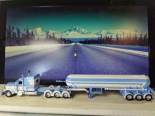 DCP 60-1996 BLUE TRI-AXLE PETE 389 W/63" SLEEPER AND MISS LP TANKER (1 ...