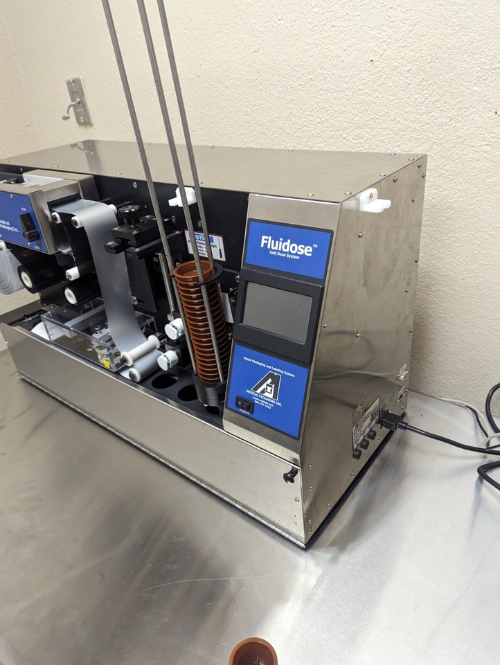 MEDICAL PACKAGING Fluidose 5H Liquid Pharmaceutical Repackaging Machine ...