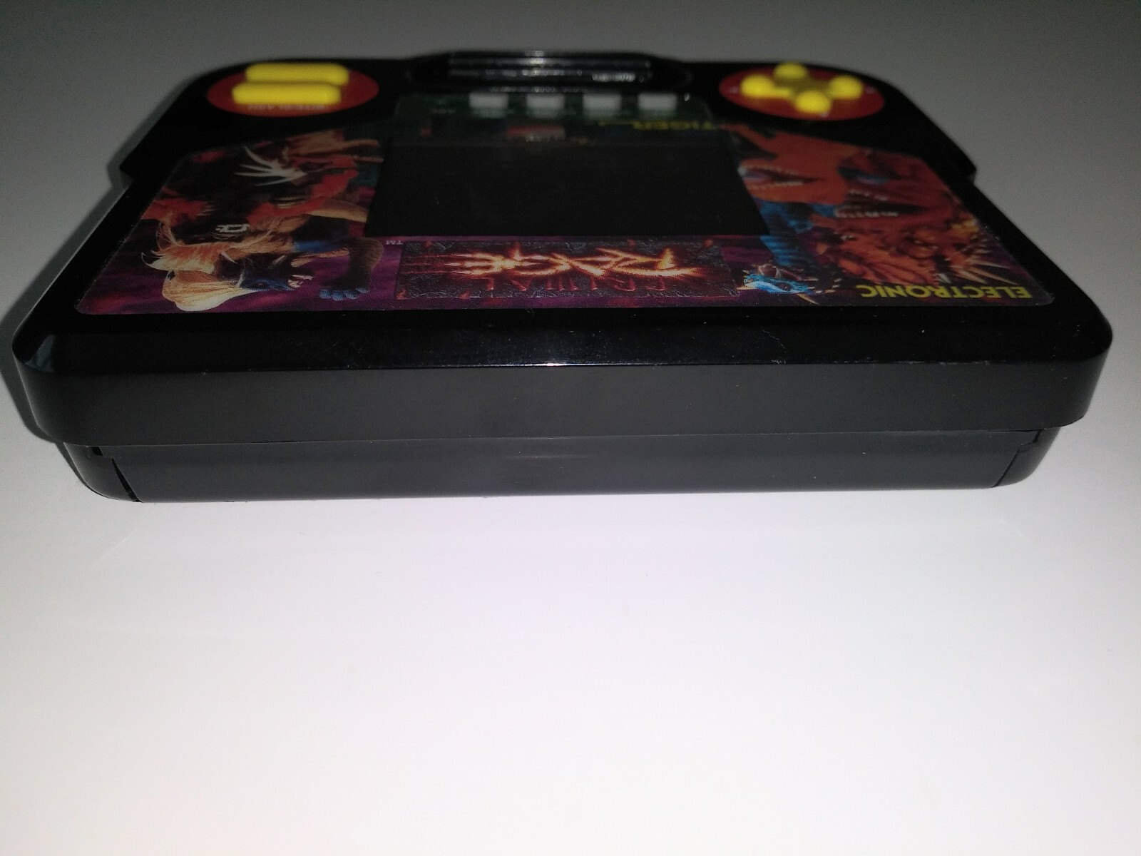 Tiger Electronics Primal Rage Handheld LCD Game 1994 Atari Games Tested ...