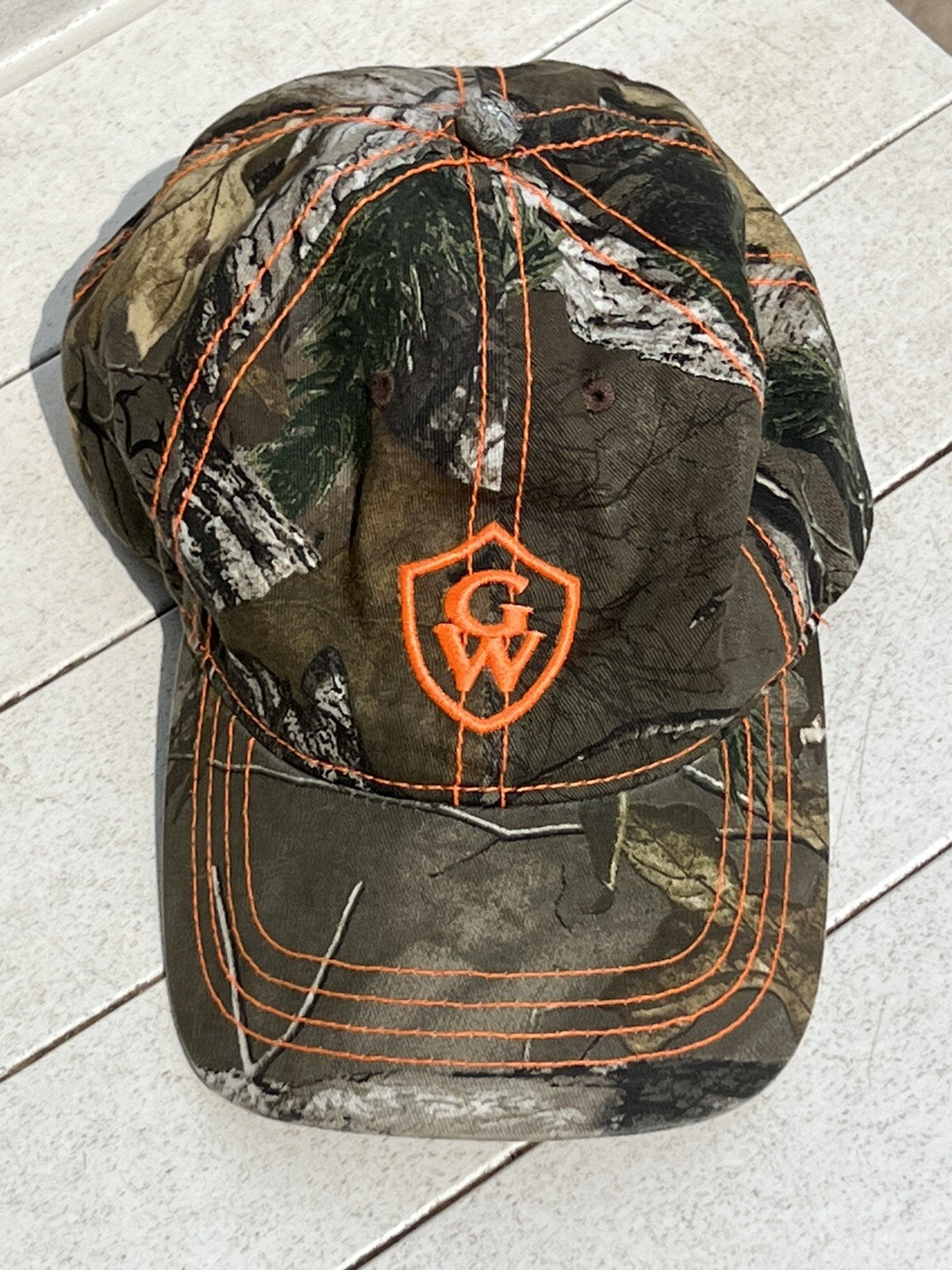 Realtree “GW” Hunting Trucker Hat - Camo With Orange Stitching ...