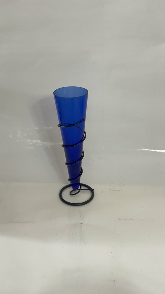 Cobalt blue glass vase with metal spiral stand. Glass is 8” L & 2-1/8 ...