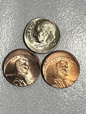 Off Center Coins With Dates: 1999P Dime, 2001 Penny, 2000 Penny. (#74 ...