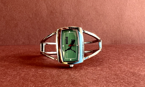 Puma Women’s Silver Tone Hinged Watch bangle Bracelet Aqua/Green Face ...