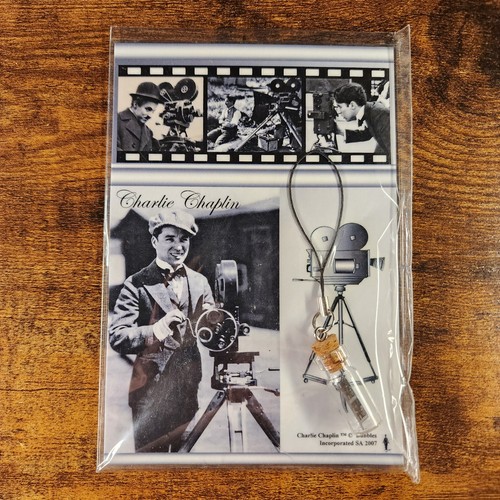 charlie chaplin vintage film cells . strip inside vial , photo montage ...