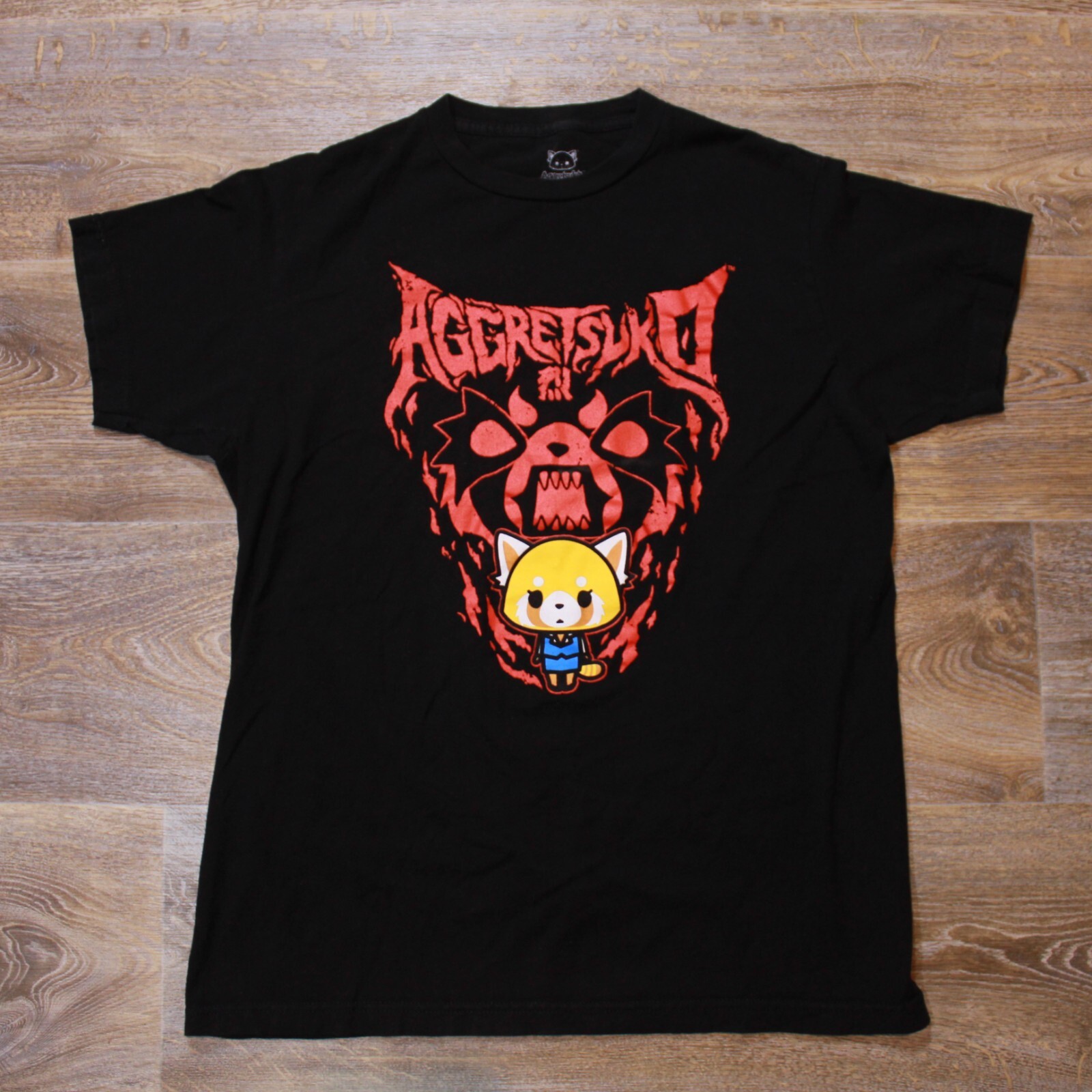 Aggretsuko Standing Calm in a Mad Demon's Shadow Bio … - Gem