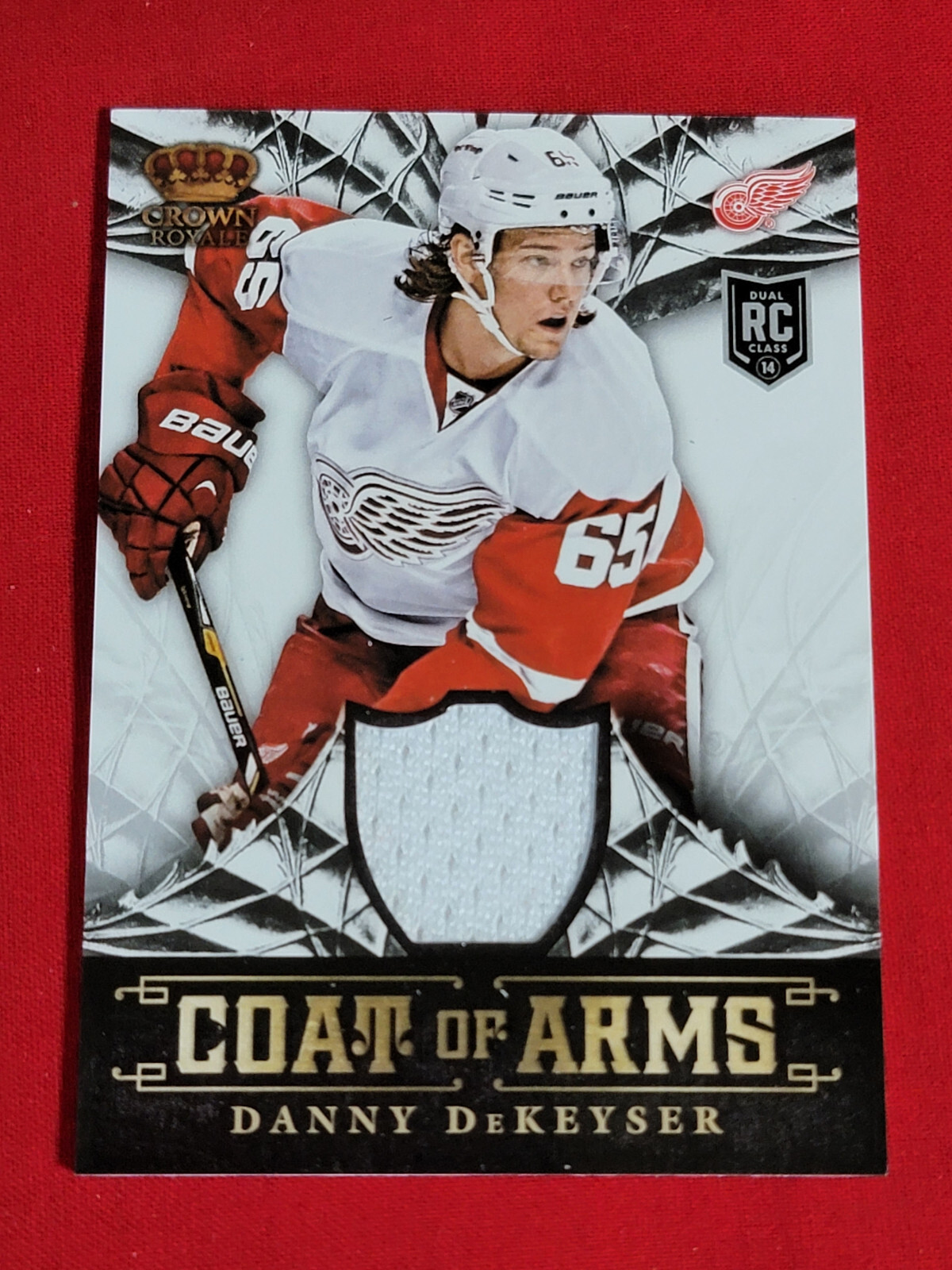 2013-14 Panini Crown Royale Danny DeKeyser Coat of Arms Materials ...
