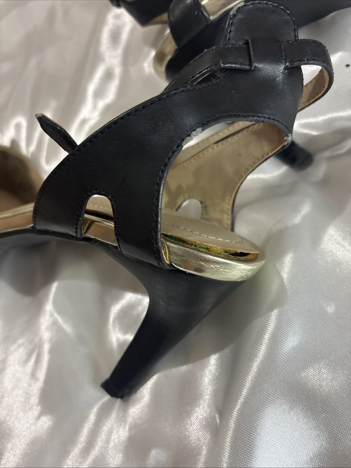 Ellen Tracy heels with a snakeskin pattern and rhinestone embellishment ...