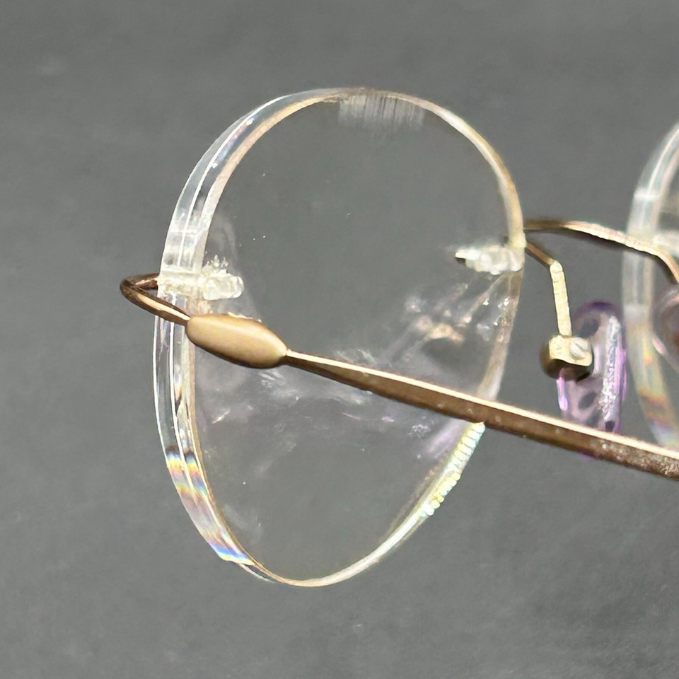 Silver Dollar Optical Beta Titanium Rimless Eyeglasses Frame Brown ...