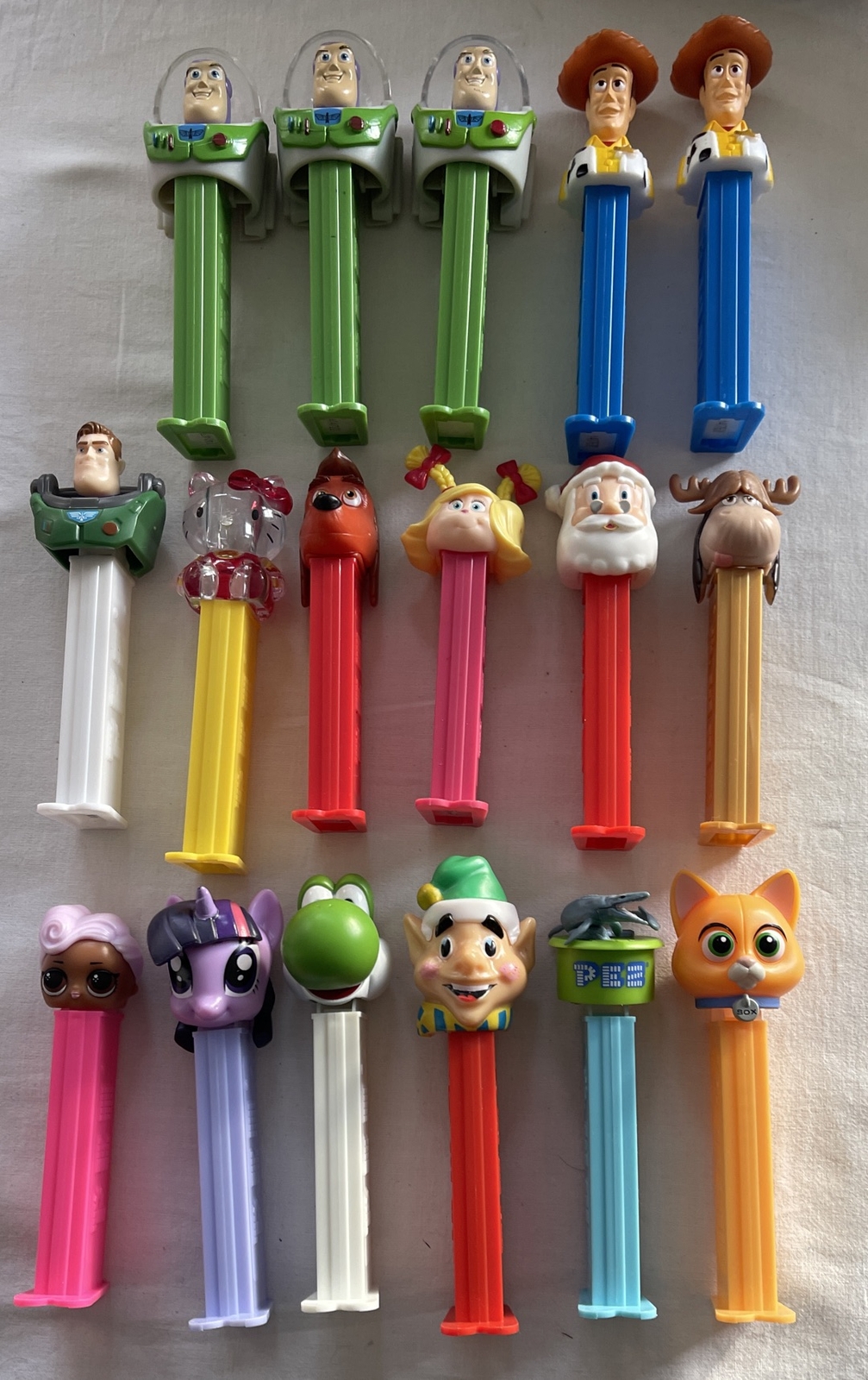 PEZ Lot Of 17 Containers Buzz Woody Santa Moose Florida Cat Hello Kitty ...