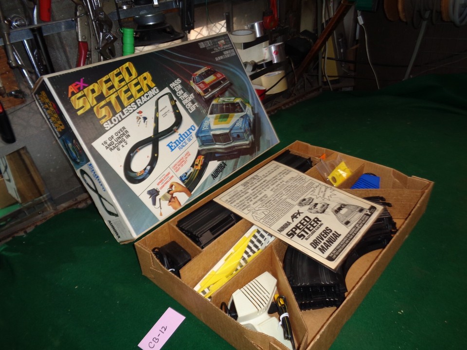 1979 Aurora AFX Road Blocker Speed Steer Slotless Race Car Set | eBay
