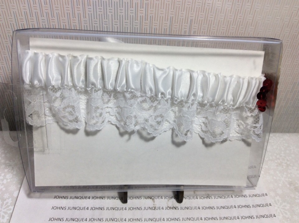 WEDDING OR PROM GARTERS New in plastic casing RED SEQUIN with White Bow ...