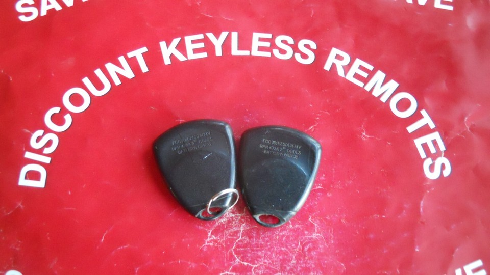 PAIR-STEALTH KEYLESS REMOTE EZSDEI474V 4-BUTTON GOOD CONDITION | eBay