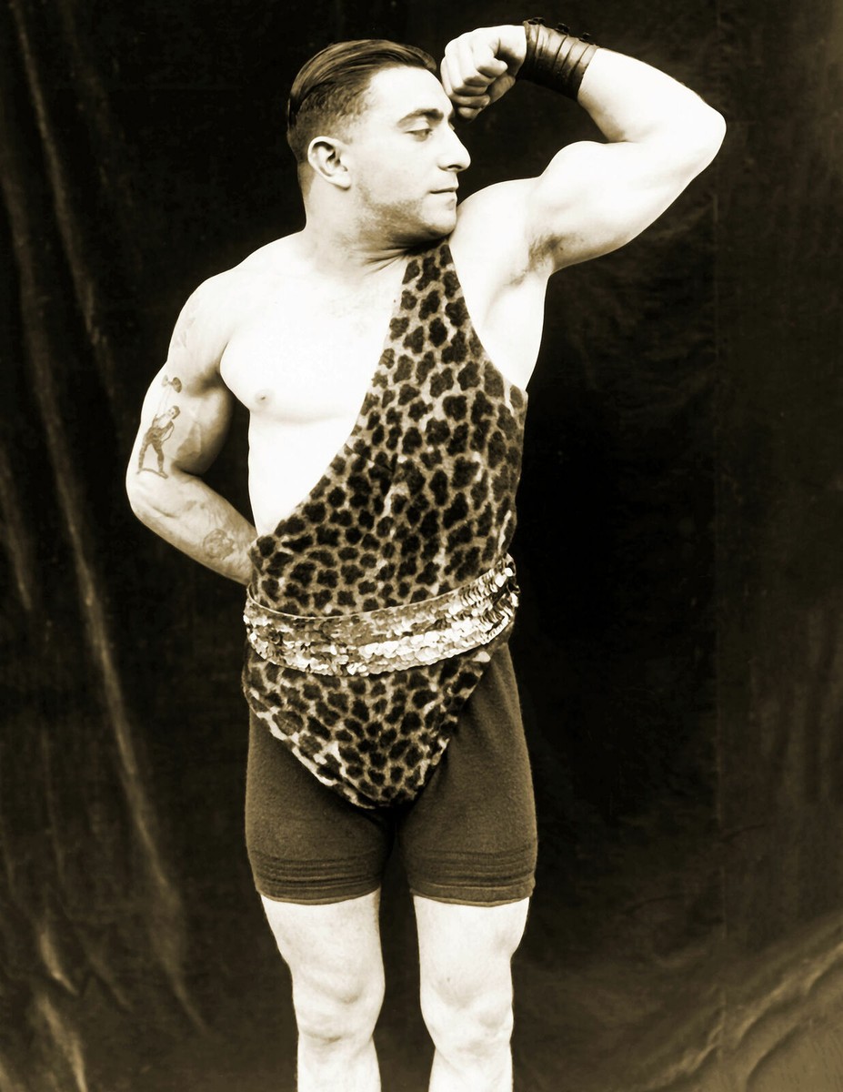 Vintage Strongman STK501873A Vintage Circus Poster Of A Strongman."