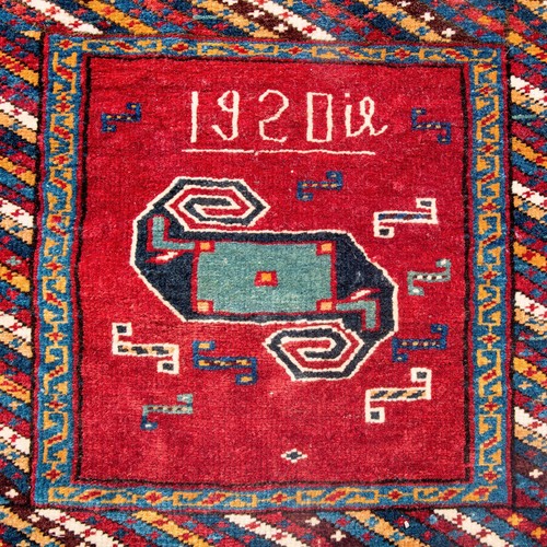 A FANTASTIC ANTIQUE ARMENIAN PINWHEEL KAZAK INSCRIBED DATED SADDLE BAG ...